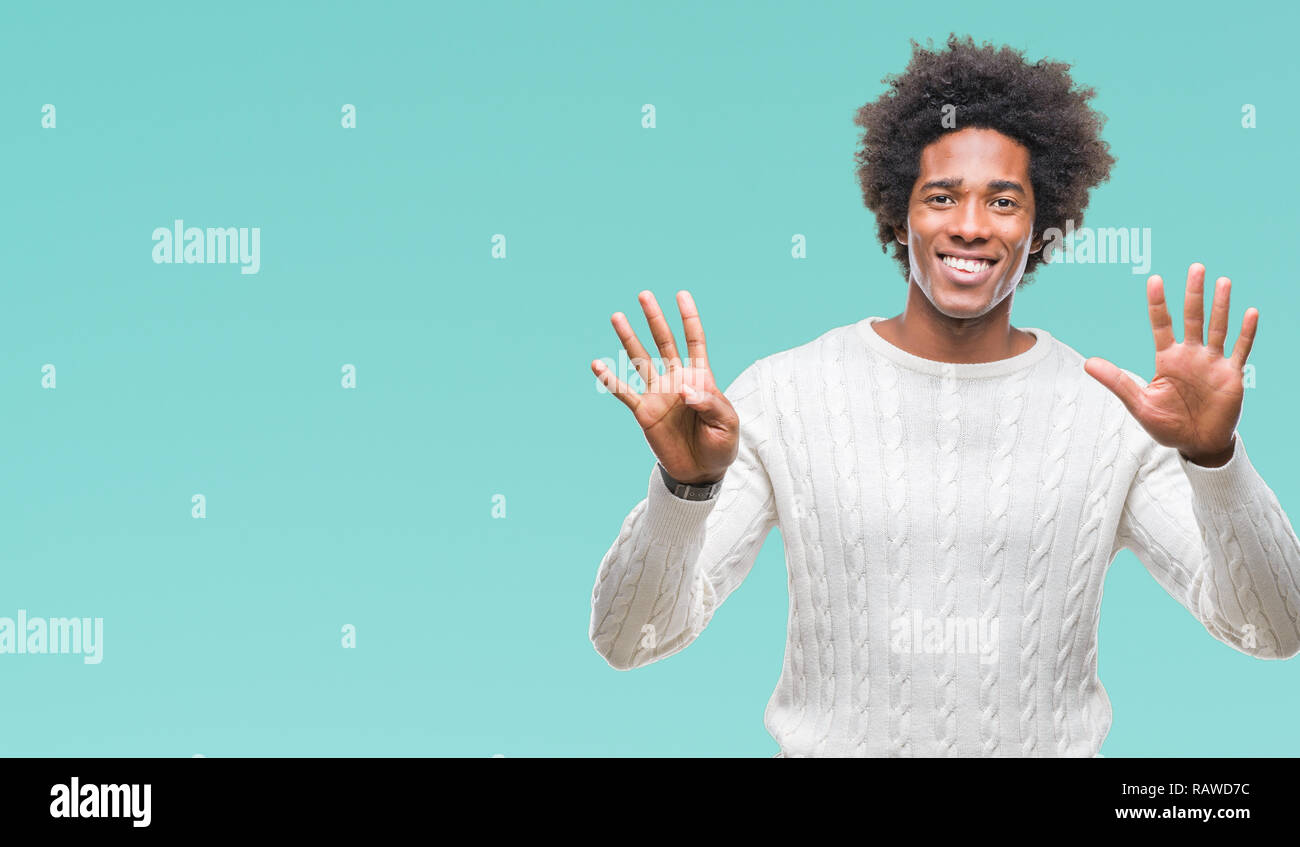 Afro american man over isolated background showing and pointing up with ...