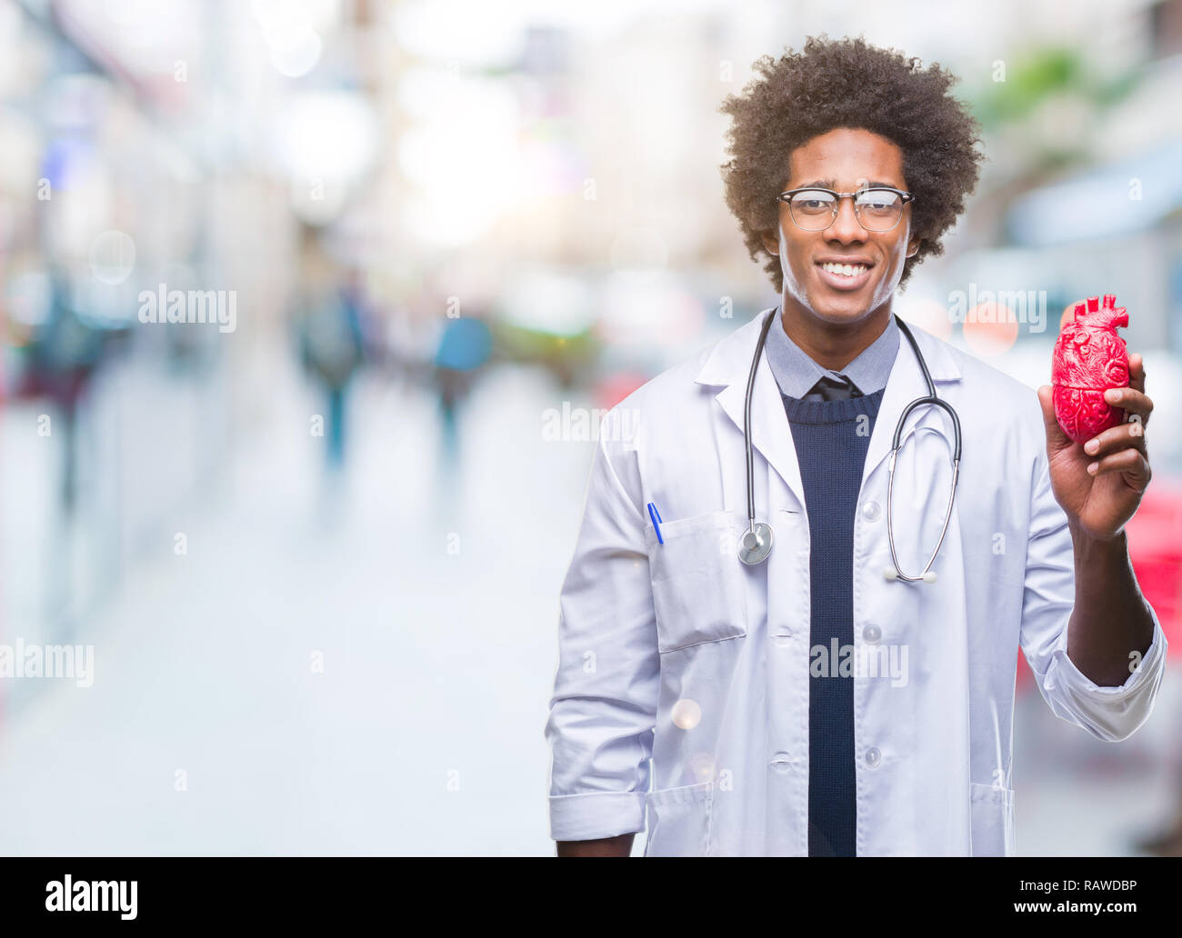 Afro american cardiologist doctor man over isolated background with a ...