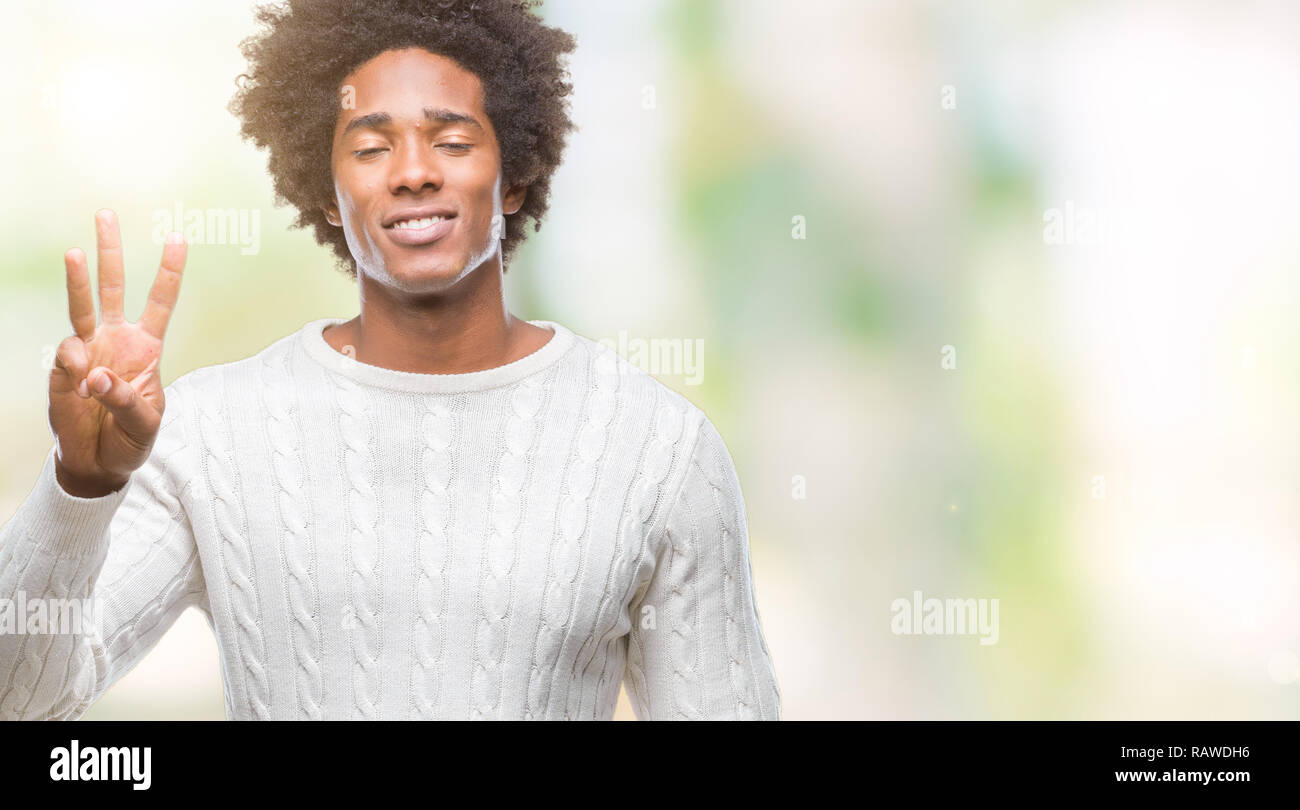 Afro american man over isolated background showing and pointing up with ...