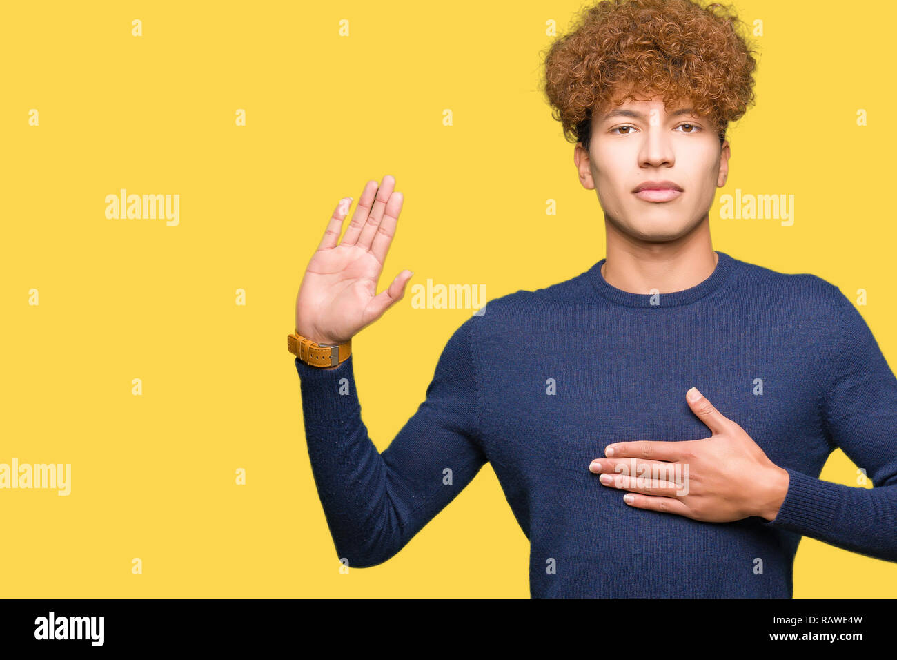 Man making oath with hand on chest hi-res stock photography and images ...