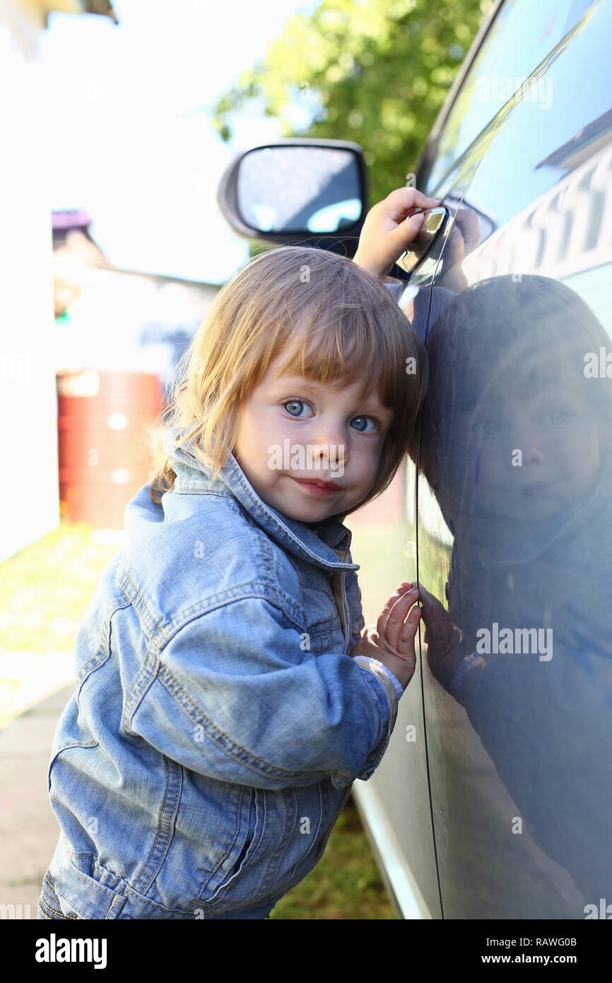 Happy little smiling child on a natural background Stock Photo - Alamy