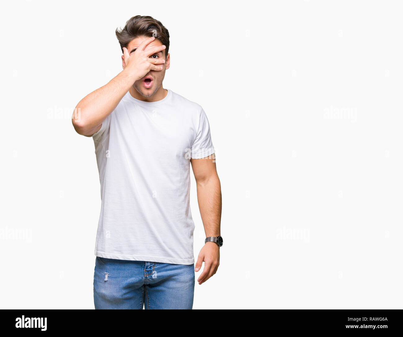 Young handsome man wearing white t-shirt over isolated background ...