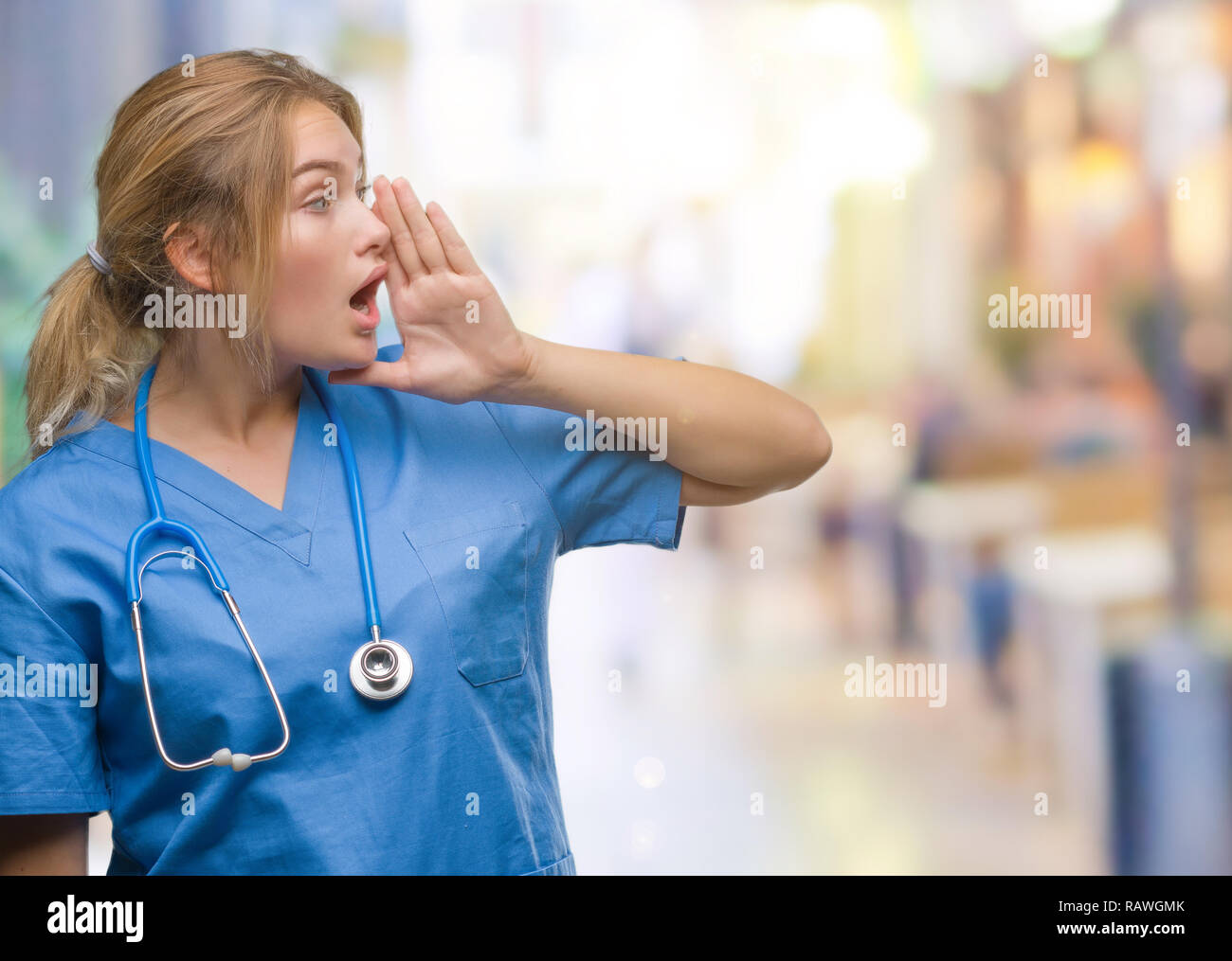 Young caucasian doctor woman wearing surgeon uniform over isolated ...