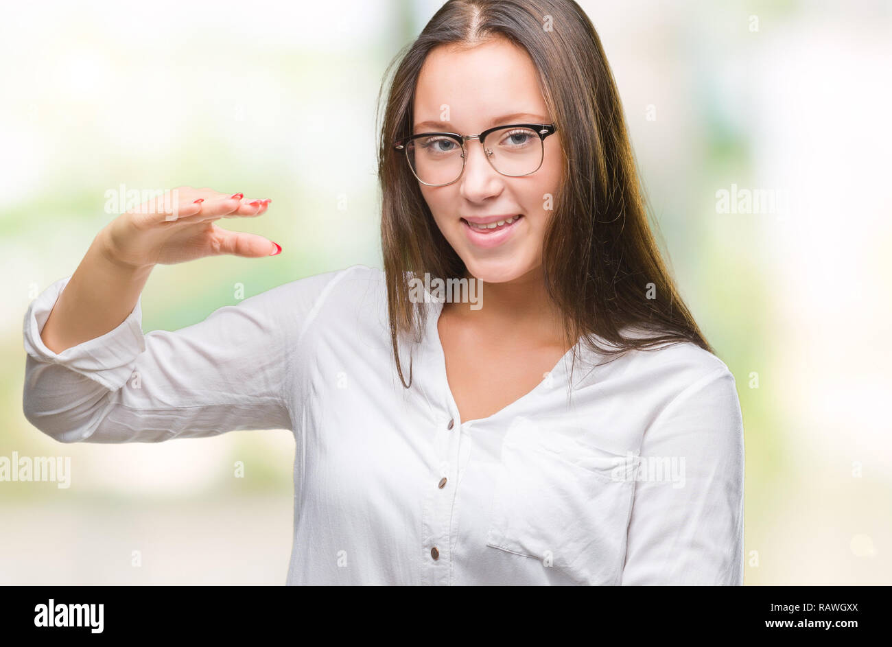 Young caucasian beautiful business woman wearing glasses over isolated ...