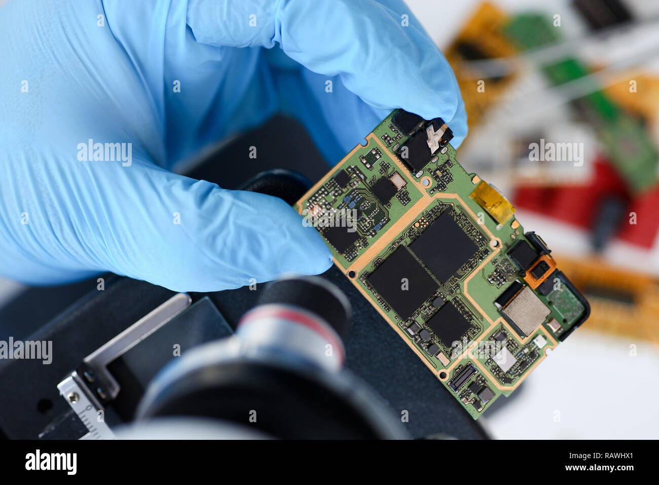 An employee of computer repair service Stock Photo - Alamy