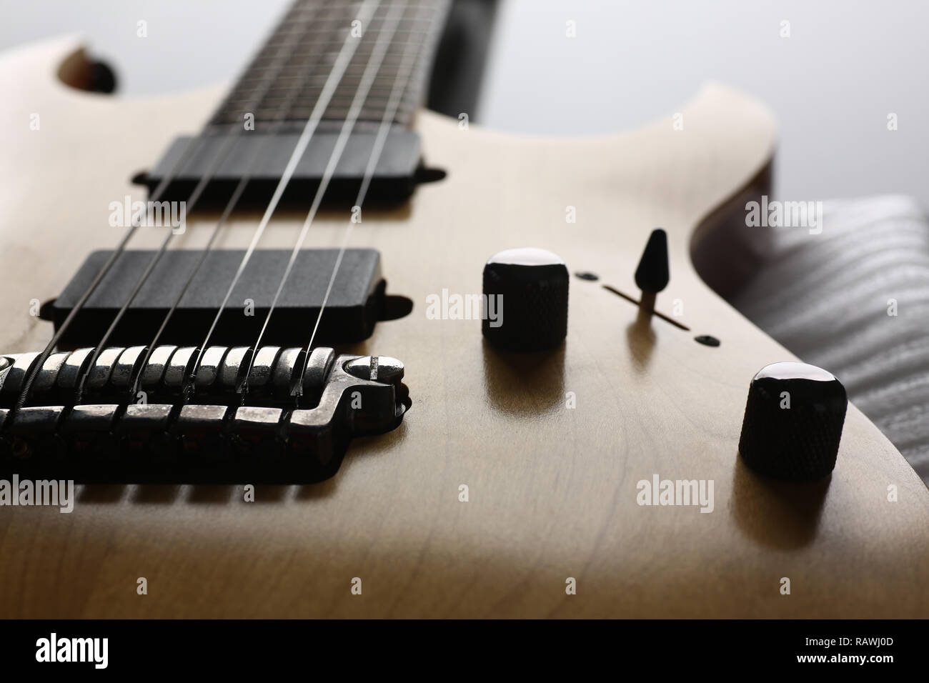 Classic shape wooden electric guitar with rosewood neck Stock Photo - Alamy