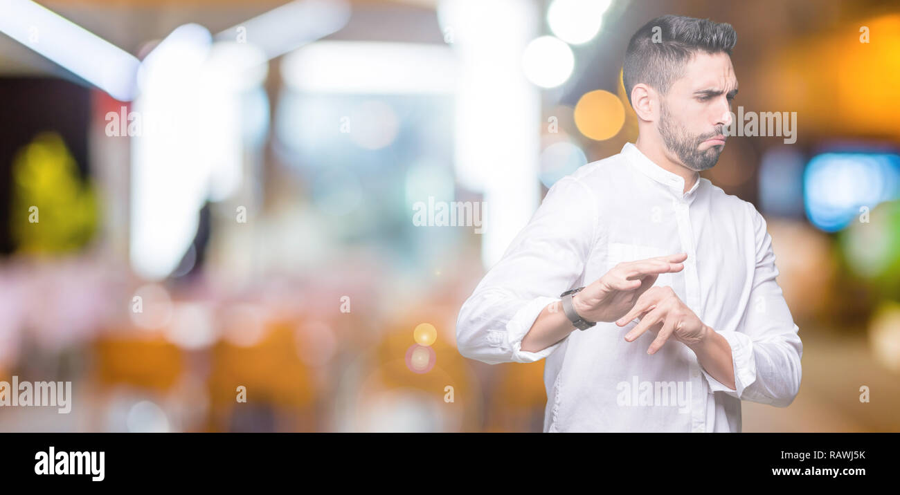 Young business man over isolated background disgusted expression ...