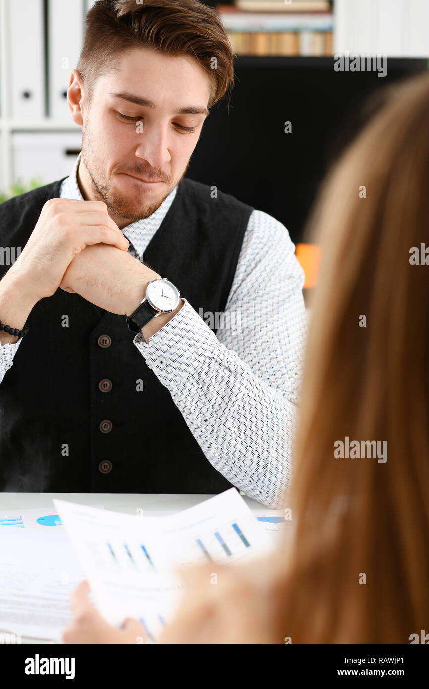 Handsome man in suit offer contract form Stock Photo - Alamy
