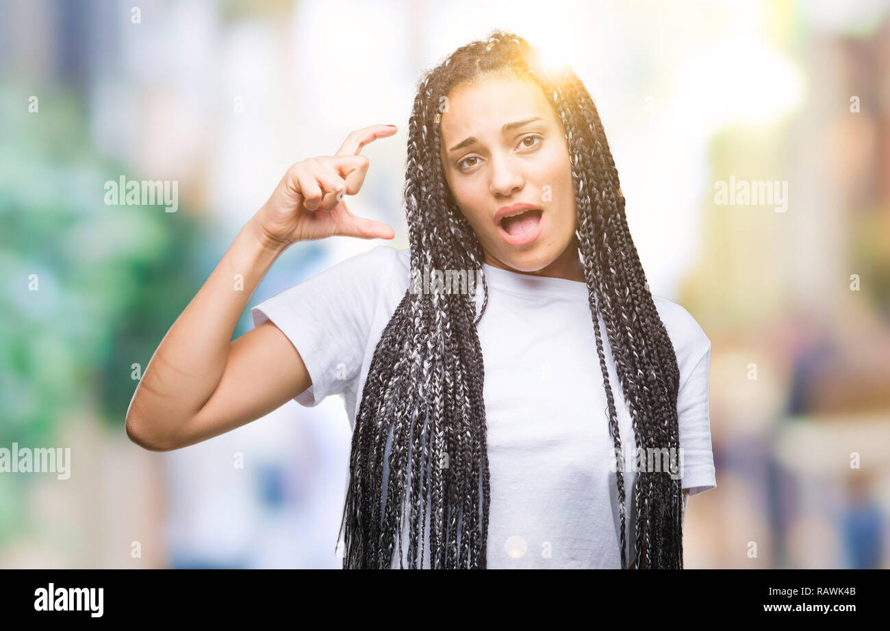 Young braided hair african american girl over isolated background ...