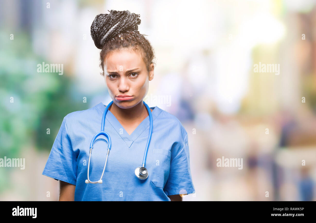 Young braided hair african american girl professional surgeon over ...