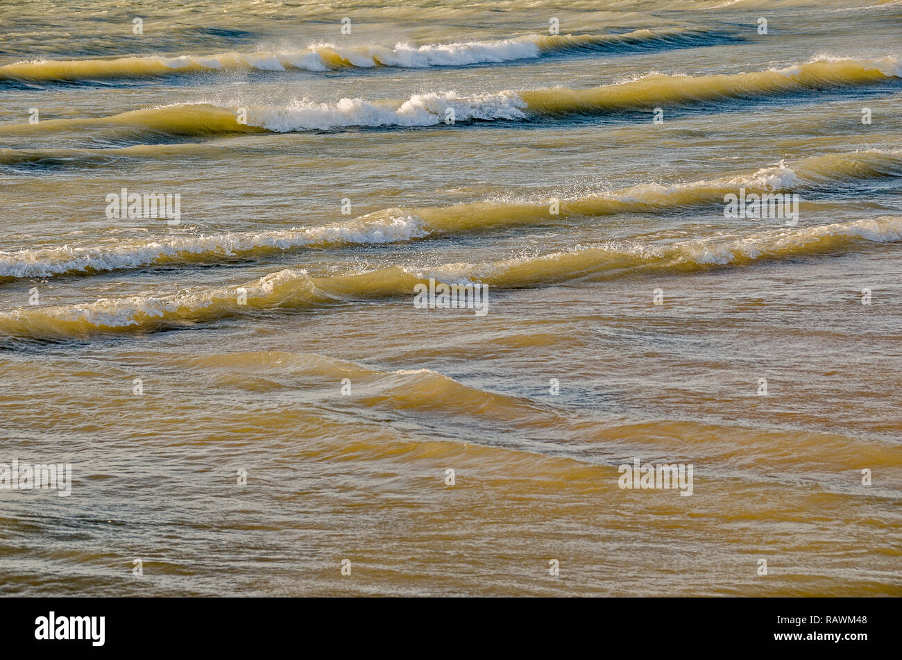 Wave after wave rolling in to shore on Lake Michigan Stock Photo - Alamy