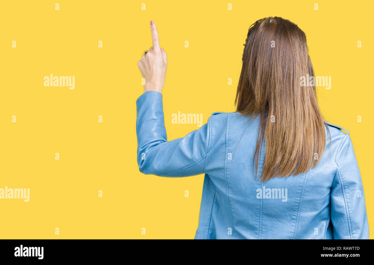 Beautiful middle age mature woman wearing fashion leather jacket over ...