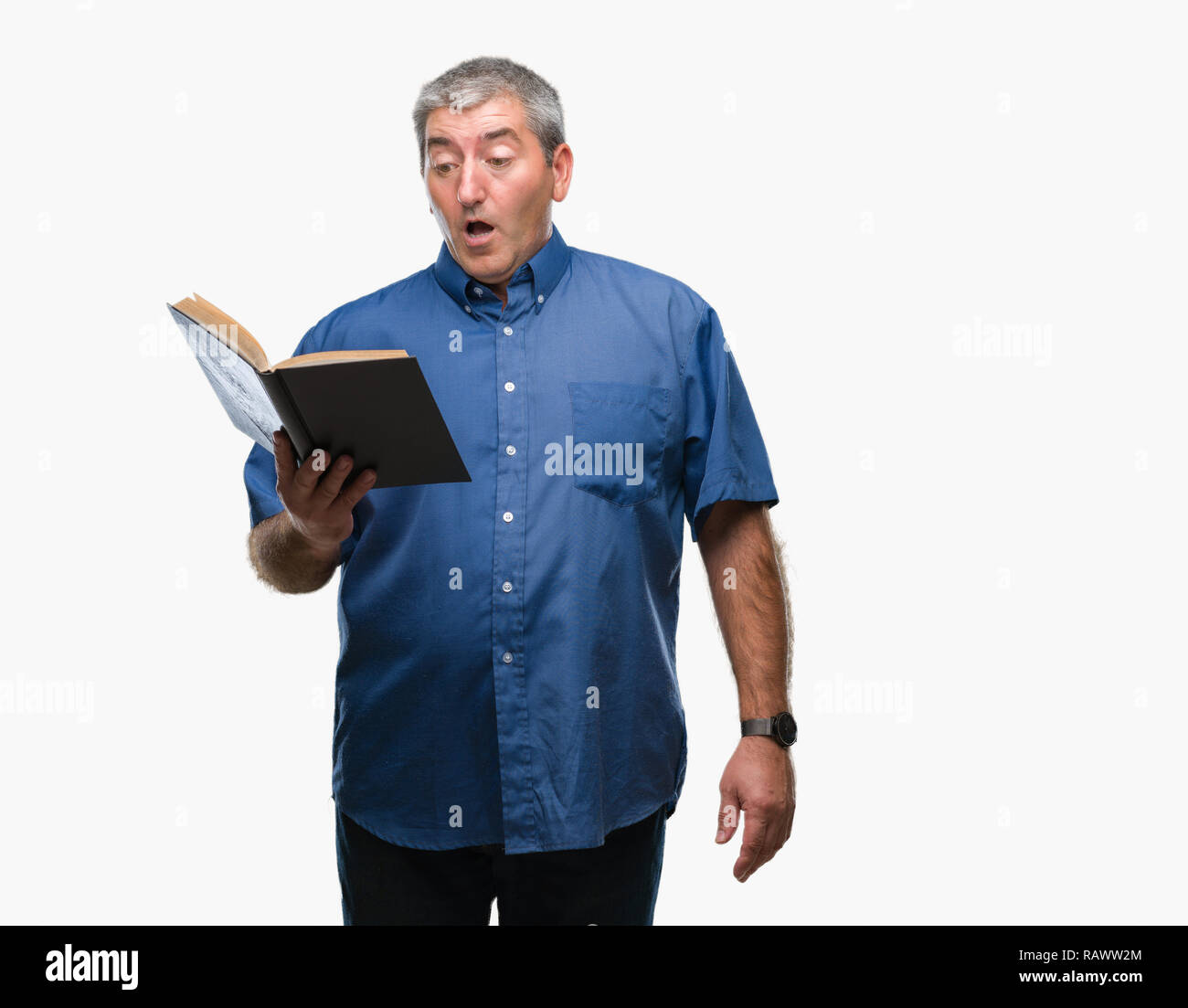 Handsome senior teacher man reading a book over isolated background ...