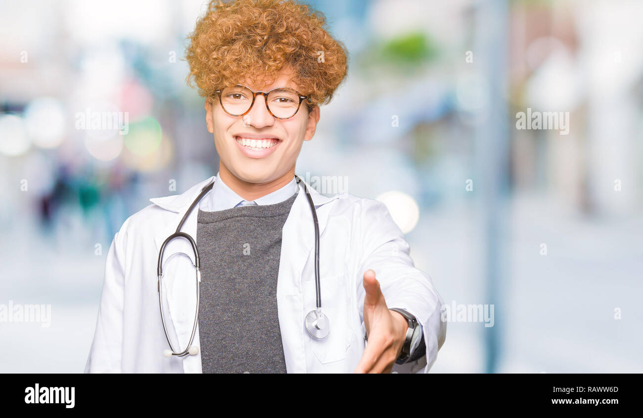 Doctor business man shake hands hi-res stock photography and images - Alamy