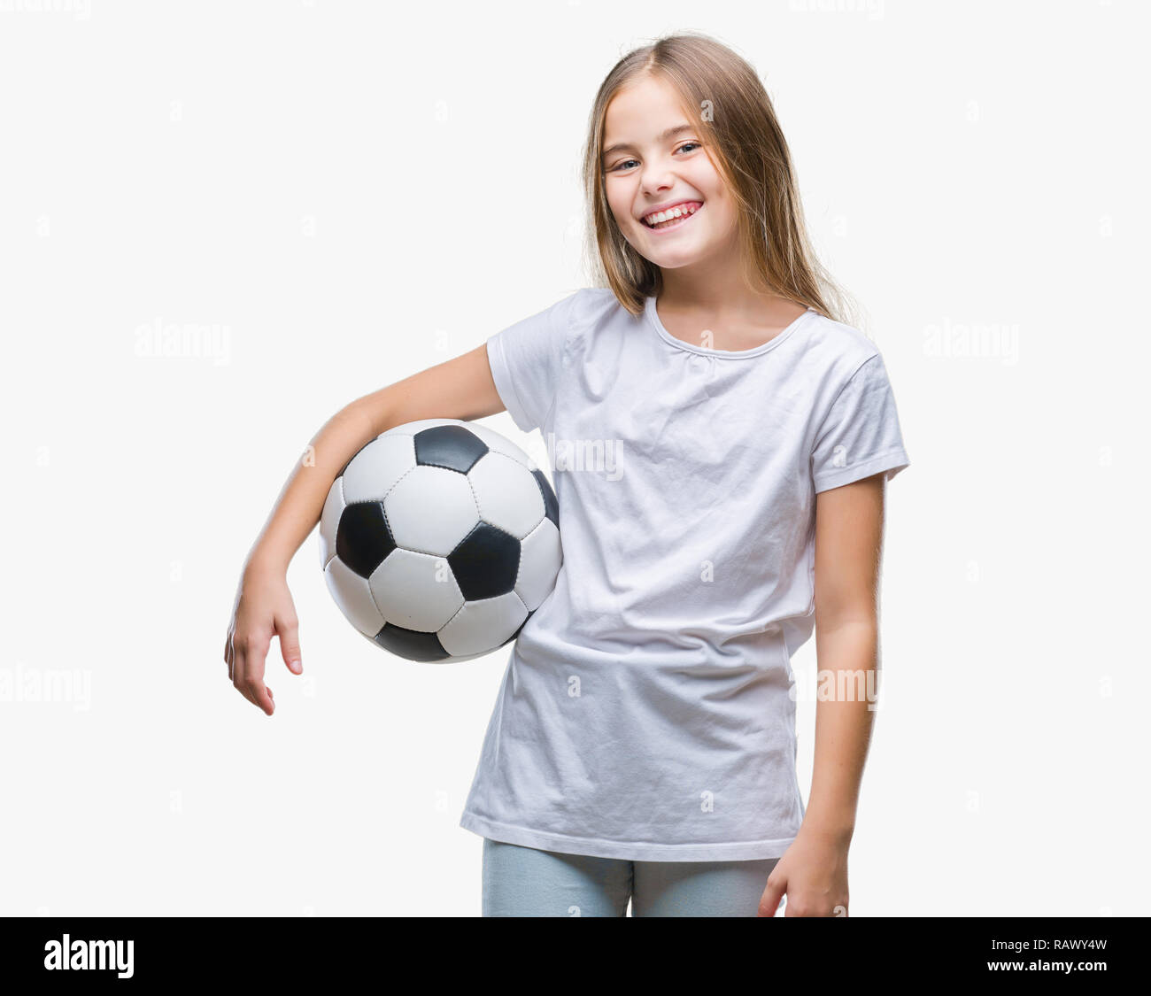 Young beautiful girl holding soccer football ball over isolated ...