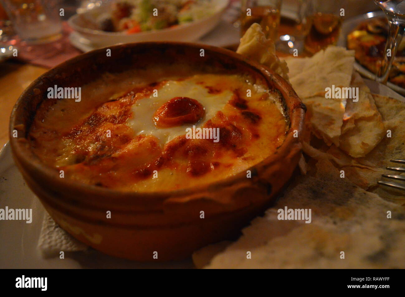 Traditional meal in a clay pot Stock Photo - Alamy