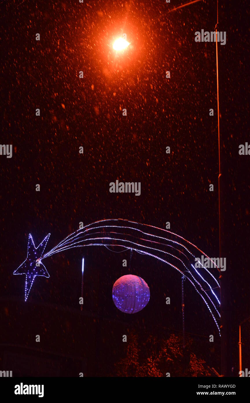 Snowing at night Stock Photo - Alamy