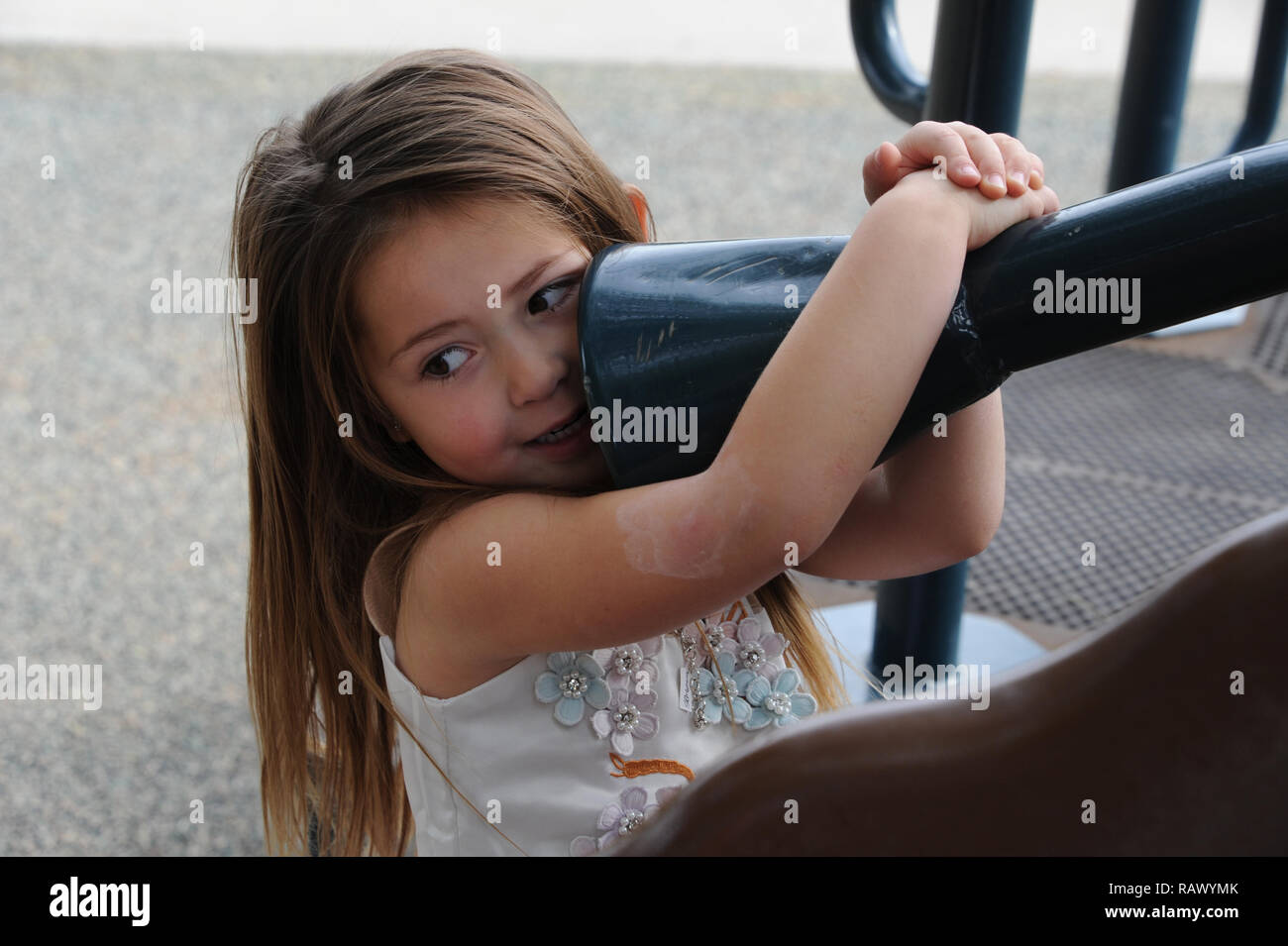 Young Girl Singing Into a Playground Funnel Wearing a Princess Dress ...