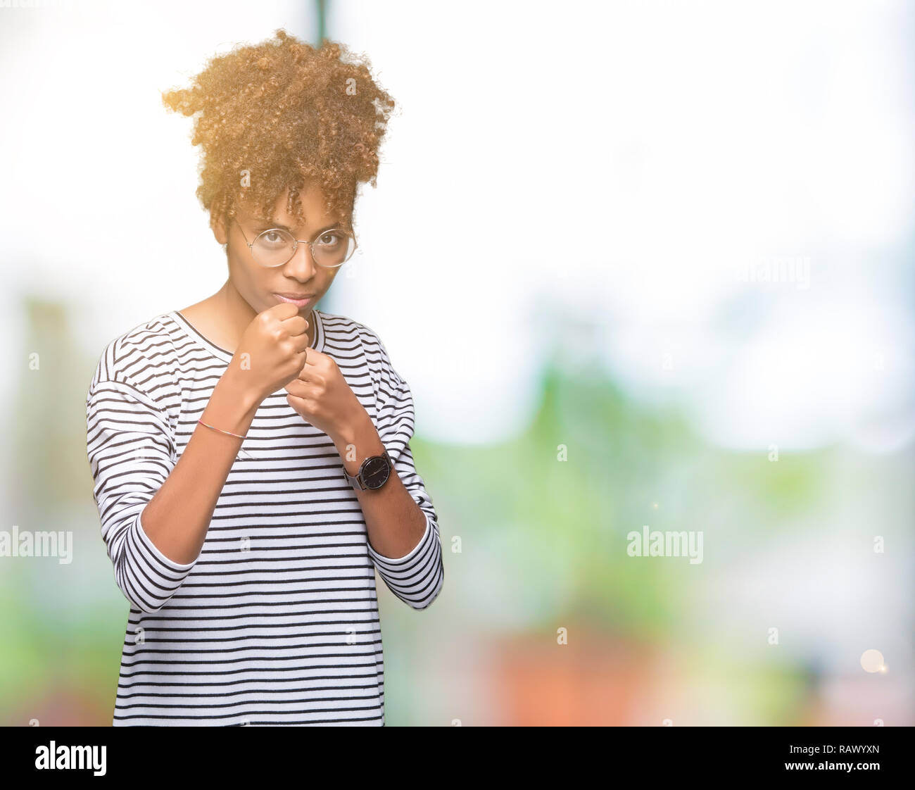 Beautiful young african american woman wearing glasses over isolated ...