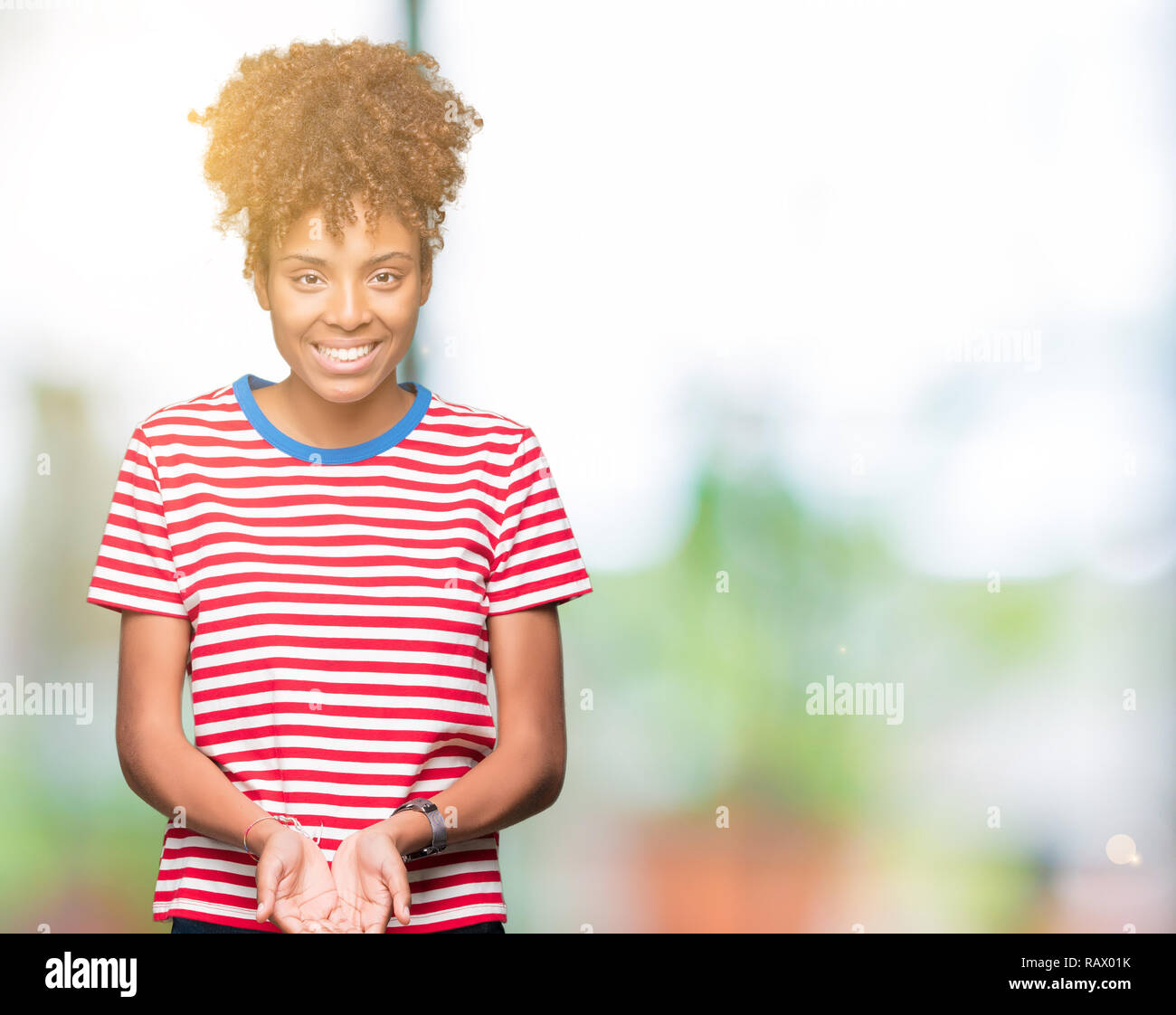 Open hands african american giving hi-res stock photography and images ...