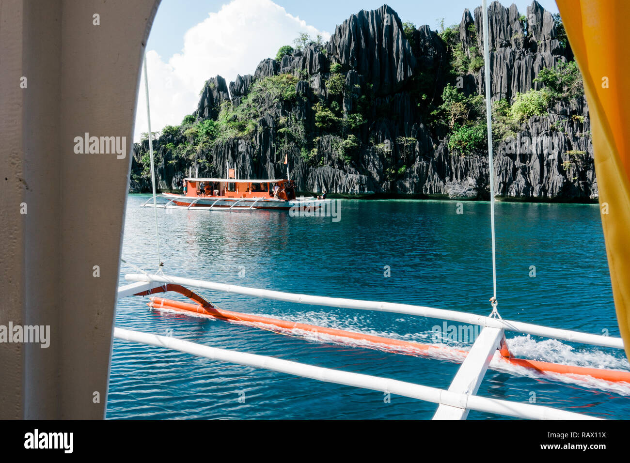 A Boat loaded with Tourist having a long day of exursion Stock Photo ...