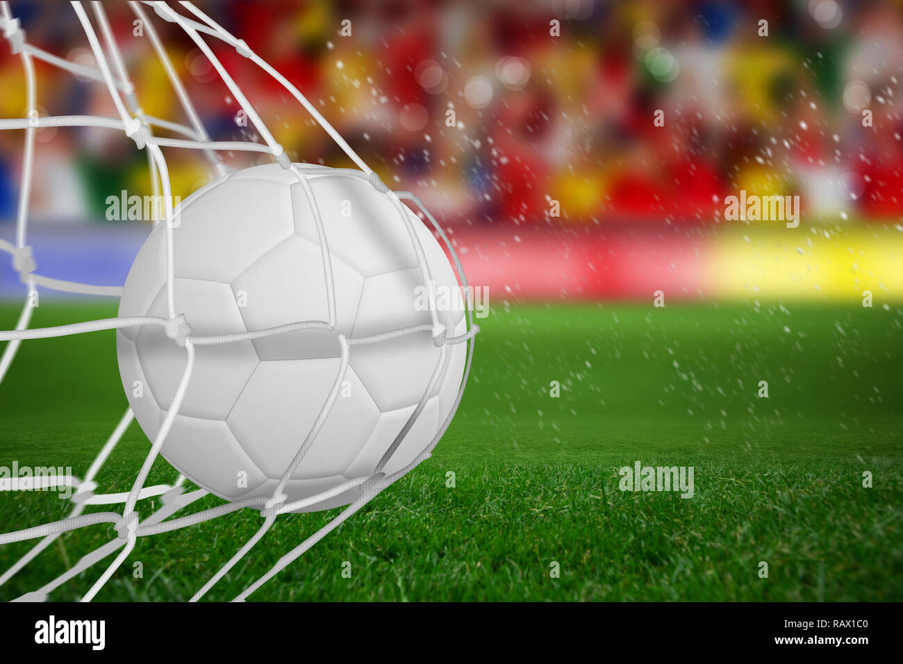 Composite image of soccer ball in goal net Stock Photo - Alamy