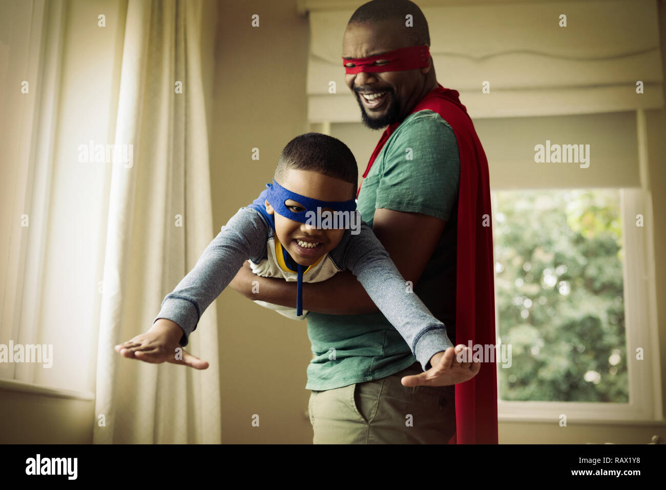 Superhero costume home hi-res stock photography and images - Alamy
