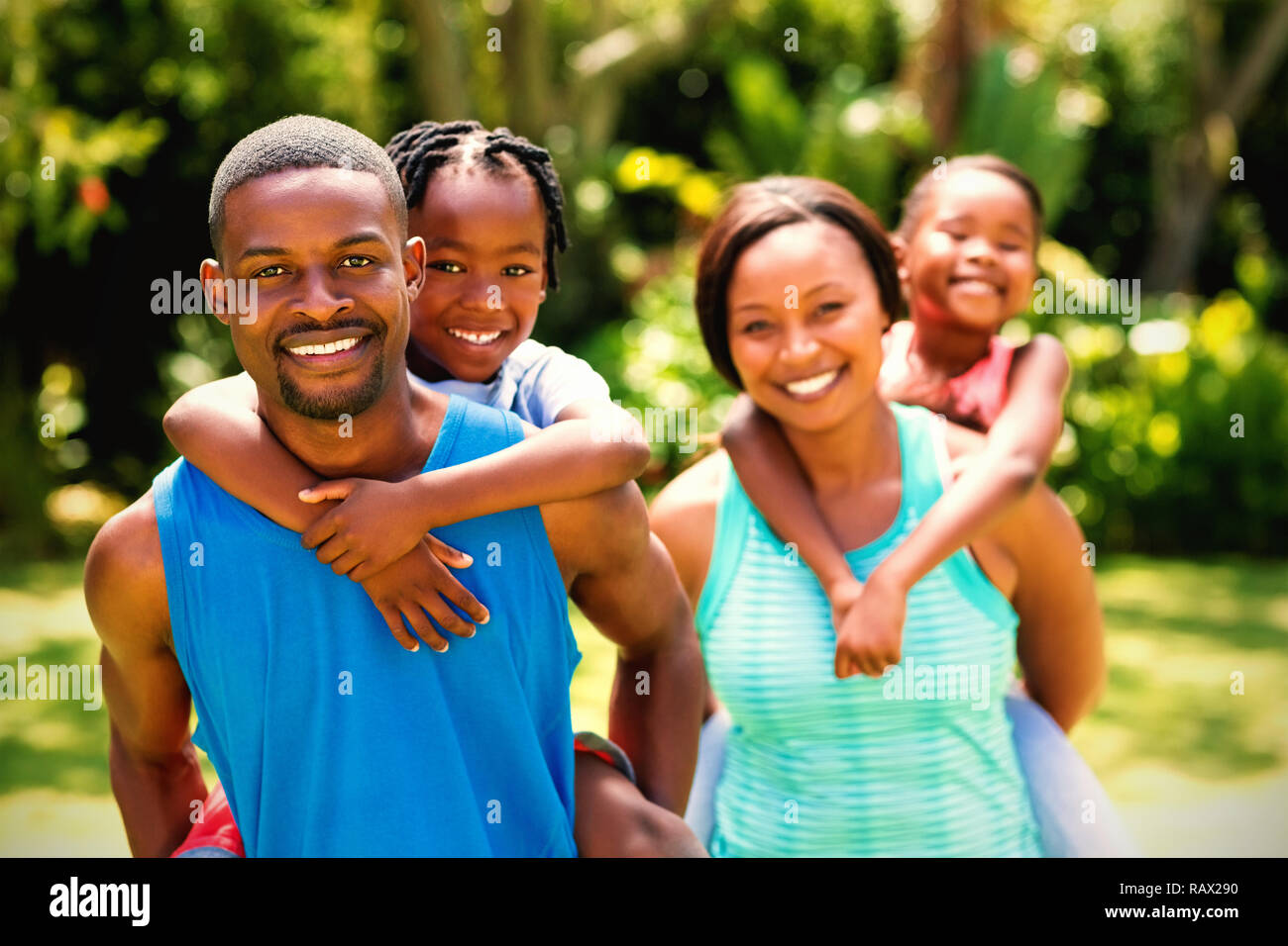 Happy family posing together Stock Photo - Alamy