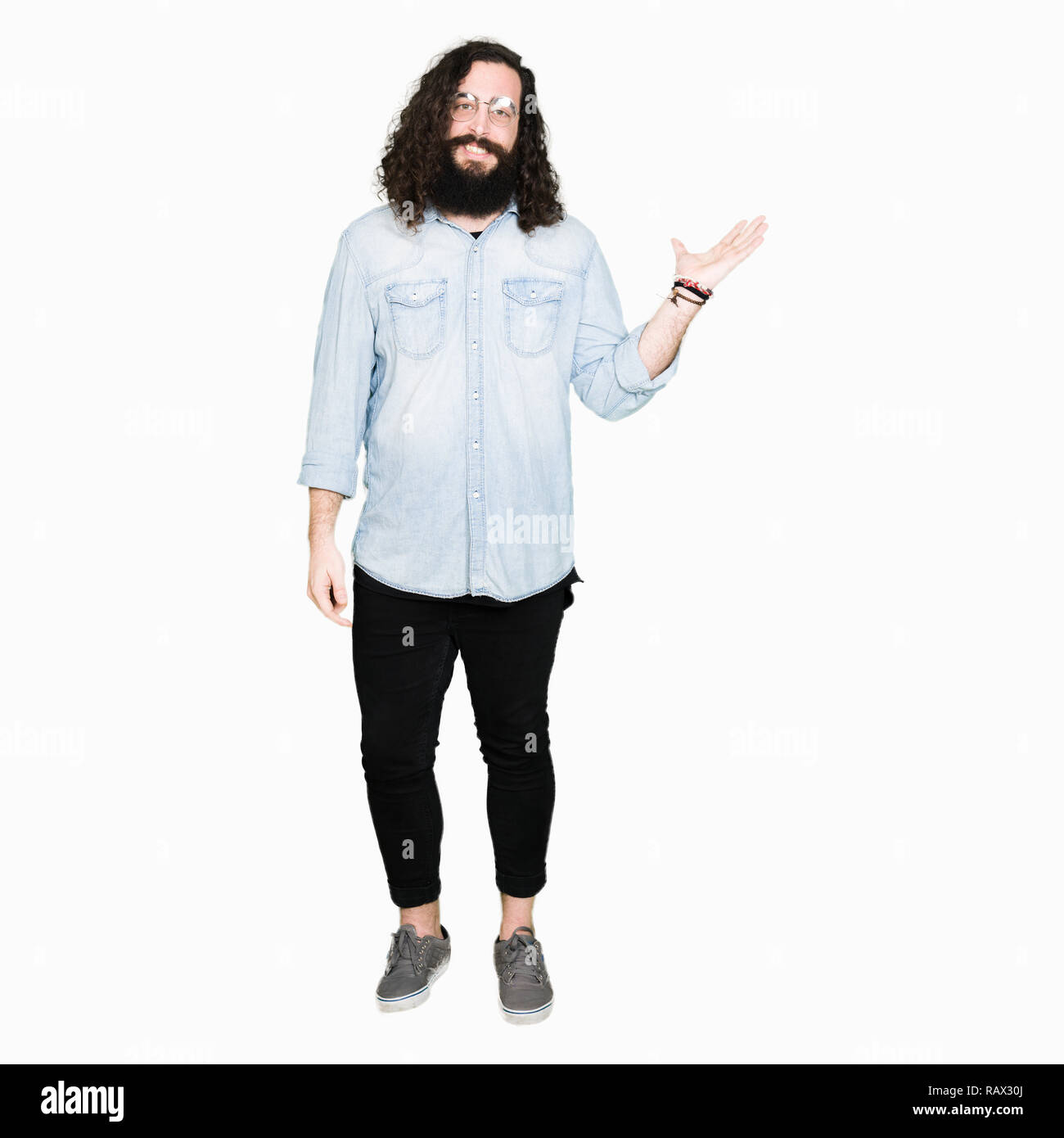 Hispanic man beard pointing palm Cut Out Stock Images & Pictures - Alamy