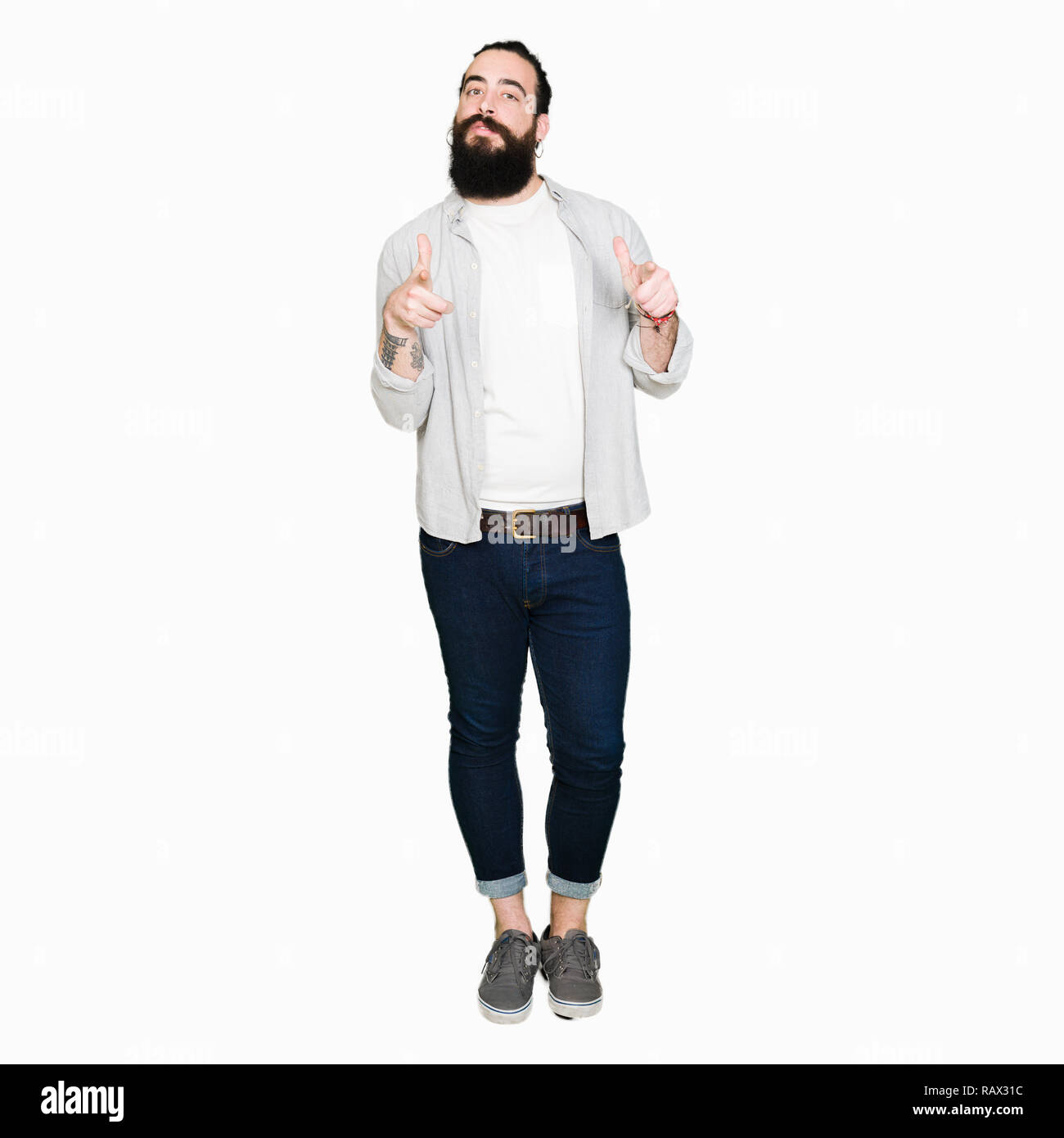 Young man long beard pointing Cut Out Stock Images & Pictures - Alamy