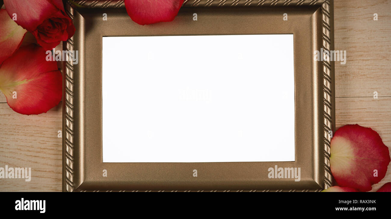 Photo frame and rose flower Stock Photo - Alamy