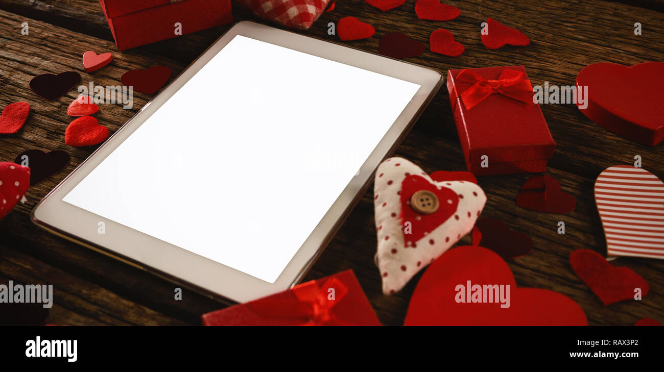 Digital tablet and valentine decorations Stock Photo - Alamy