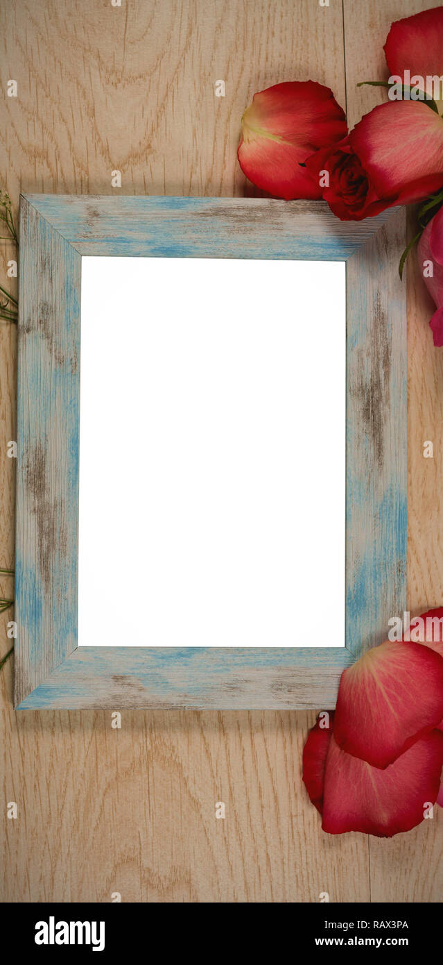 Photo frame and rose flower Stock Photo - Alamy