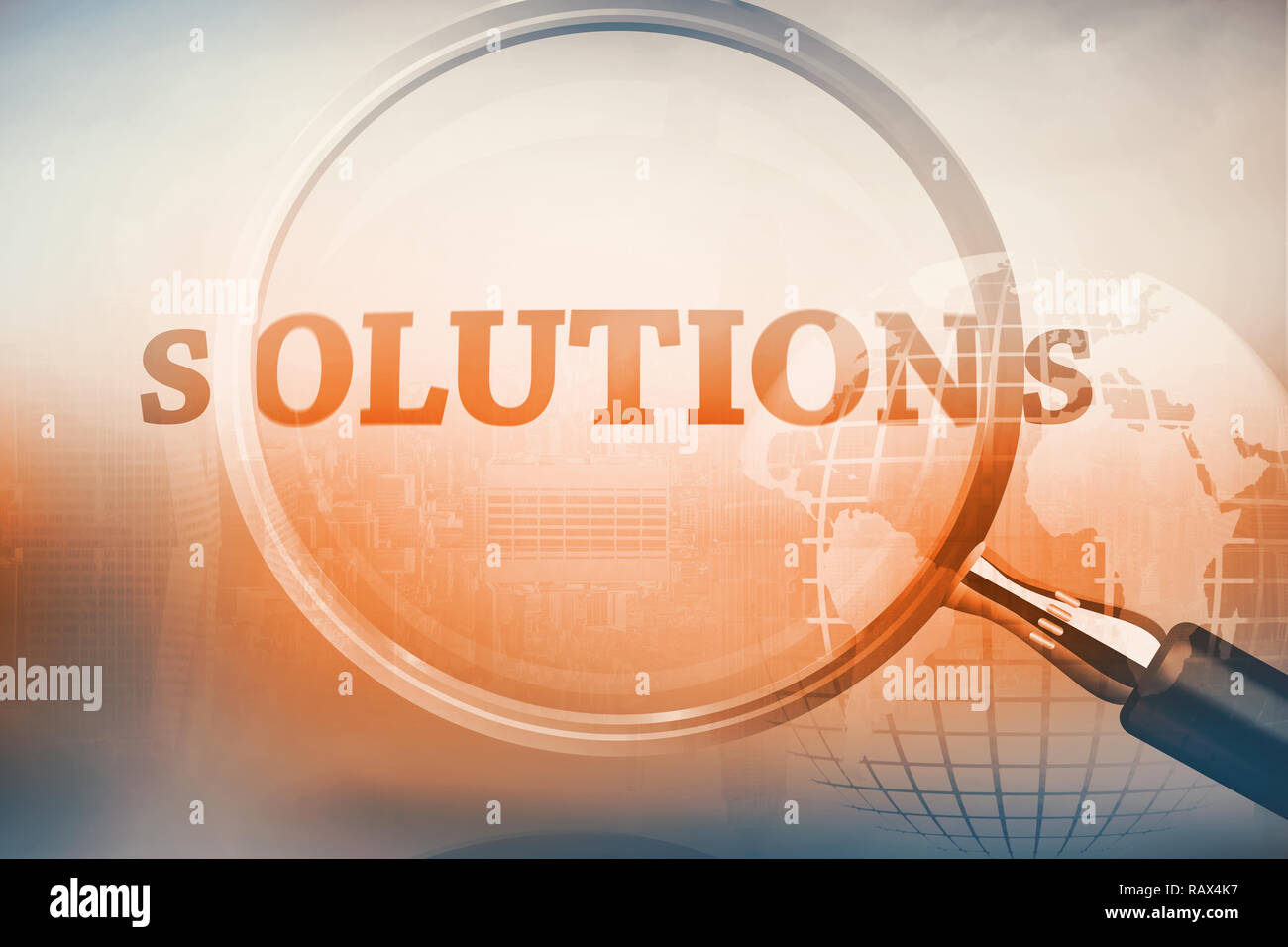 Magnifying glass showing solutions word Stock Photo - Alamy