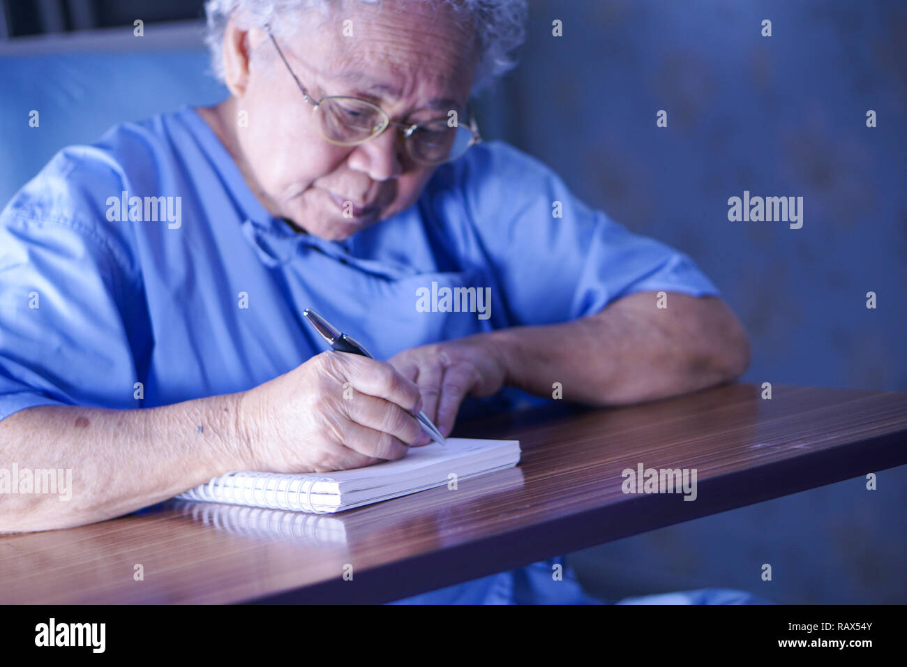 Elderly woman writing letter hi-res stock photography and images - Alamy