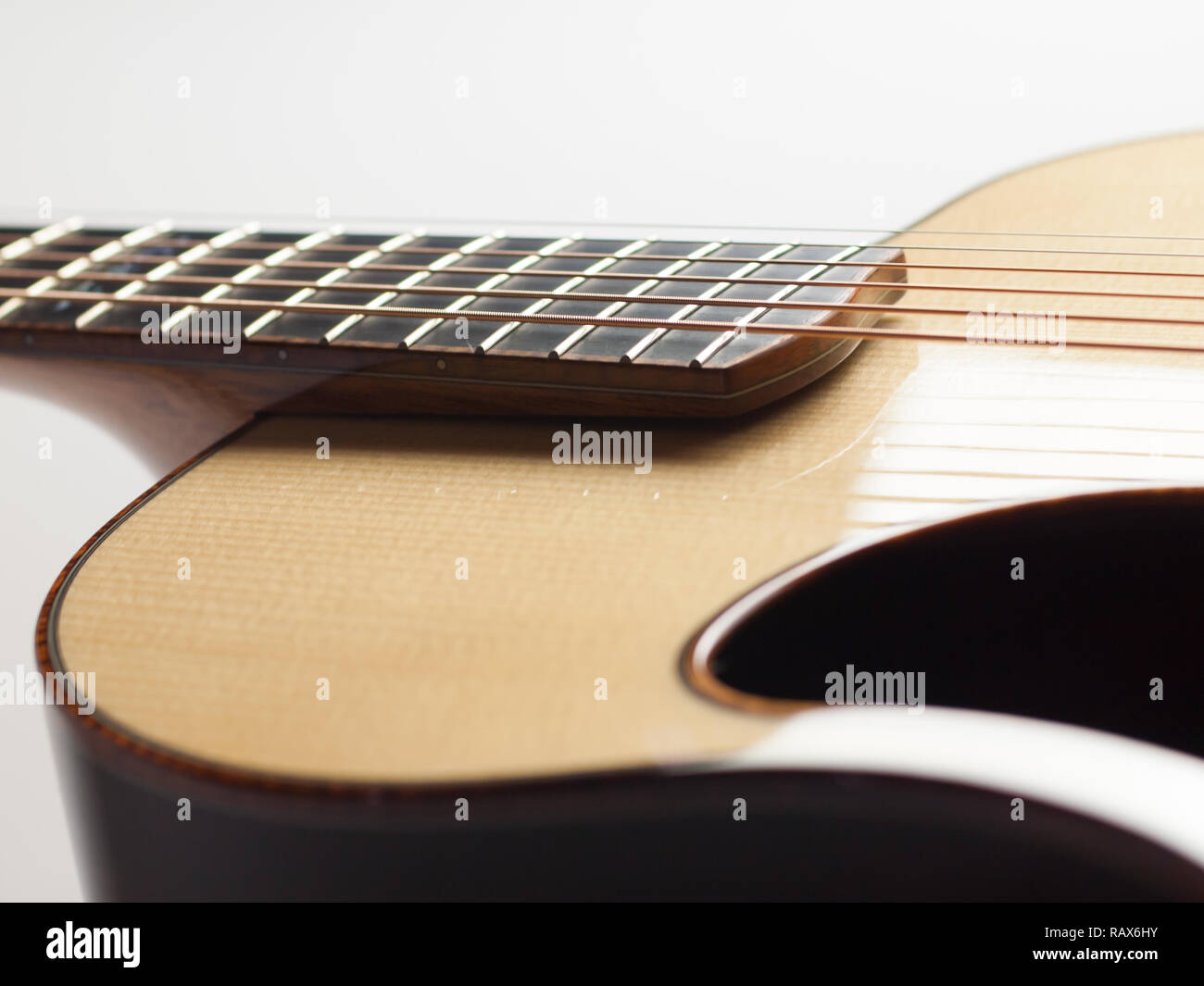 Acoustic wooden guitar close up detail Stock Photo - Alamy