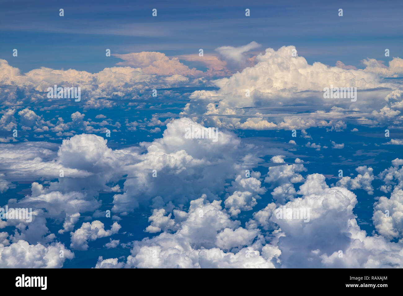 Beautiful view from window of plane flying over clouds. Natural ...