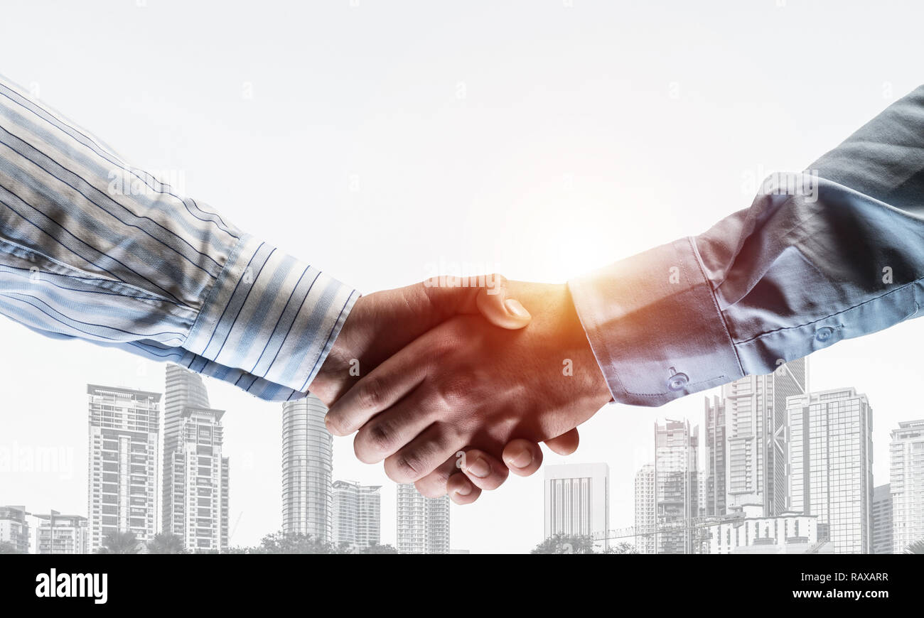 Business handshake as idea for unity and cooperation or greeting Stock ...