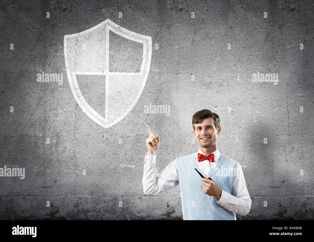 Elegant banker wearing red tie and shield sign as safety concept Stock ...