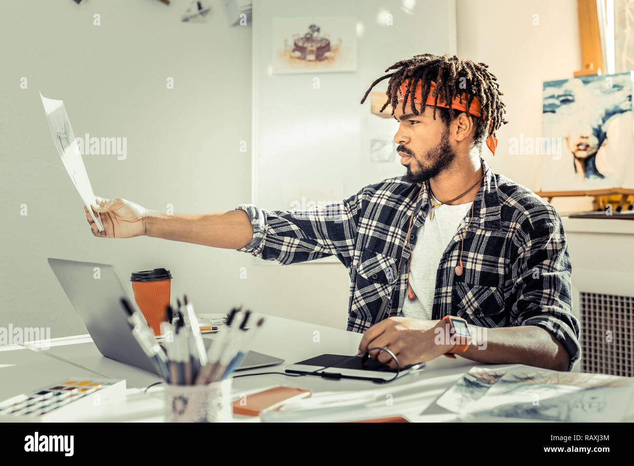 Professional bearded interior designer drawing some sketches Stock ...