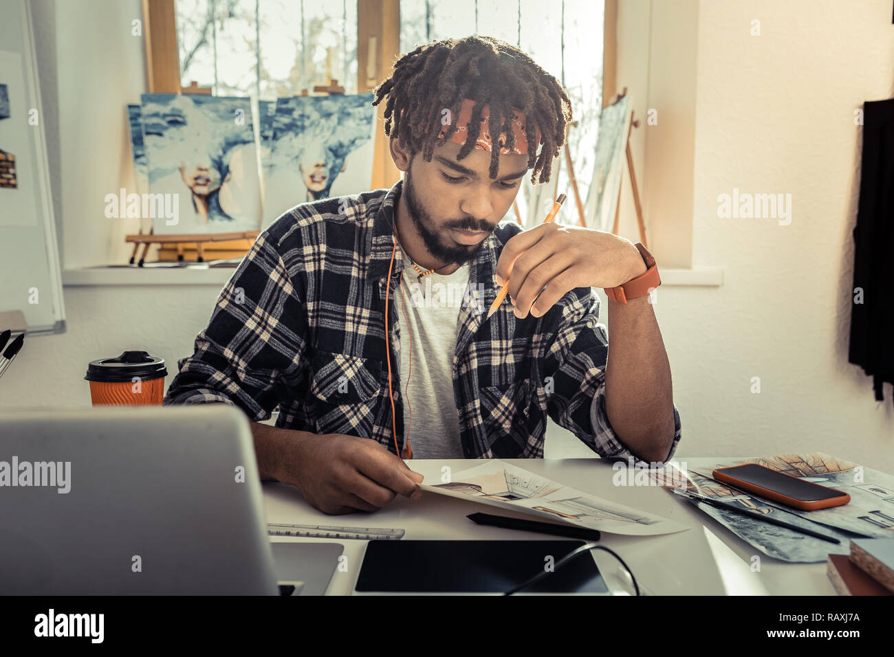 Professional talented interior designer drawing new sketches Stock ...