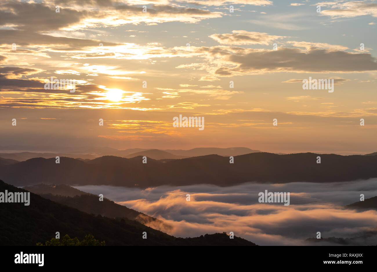 Morning Sun Burns Off Low Lying Morning Clouds in Smoky Mountains Stock ...