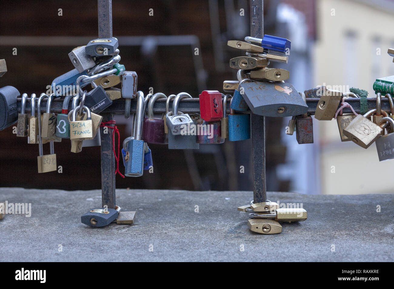 Love lock padlocks attached to the railings of Lovers Bridge in Prague ...