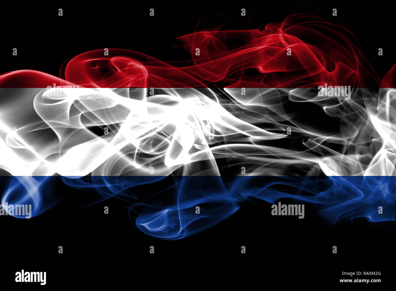 National flag of Netherlands made from colored smoke isolated on black ...