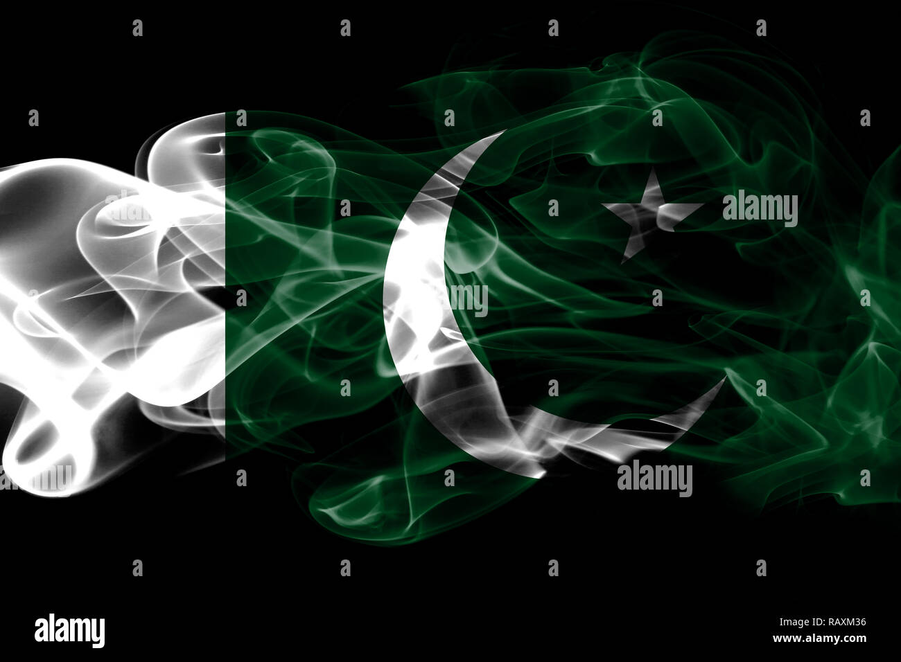 National flag of Pakistan made from colored smoke isolated on black ...