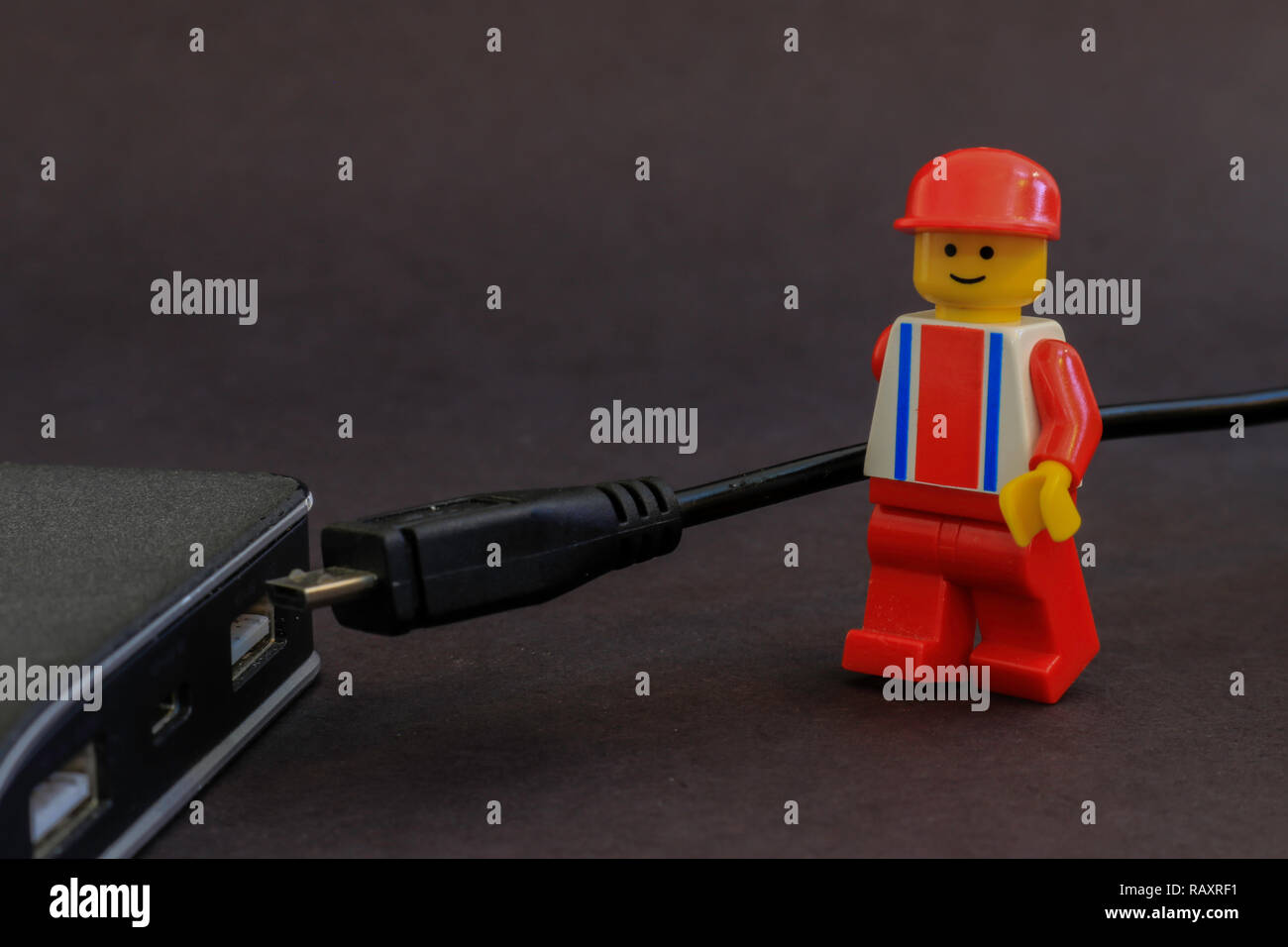 Plug in and charge up Stock Photo - Alamy