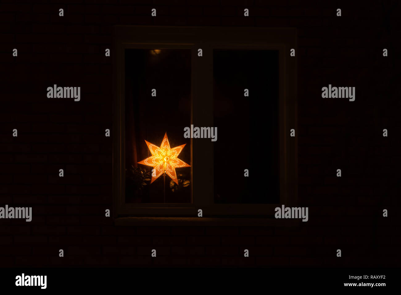 Christmas Star Lamp in Window Stock Photo - Alamy