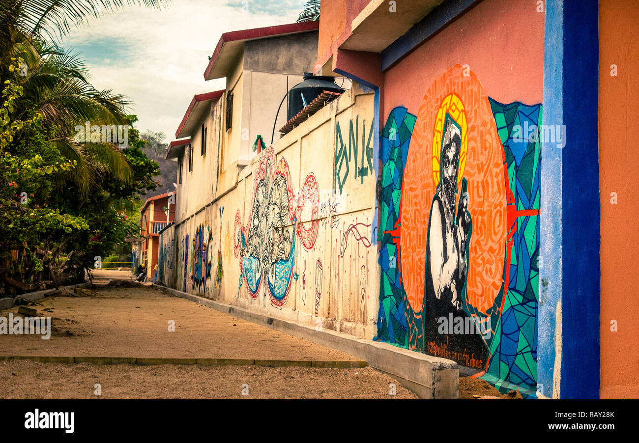 Graffiti art on a lonely alley next to the beach Stock Photo - Alamy