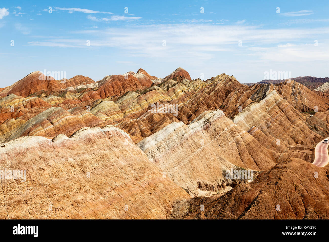 Striped rock formations in Danxia Feng, or Colored Rainbow Mountains ...