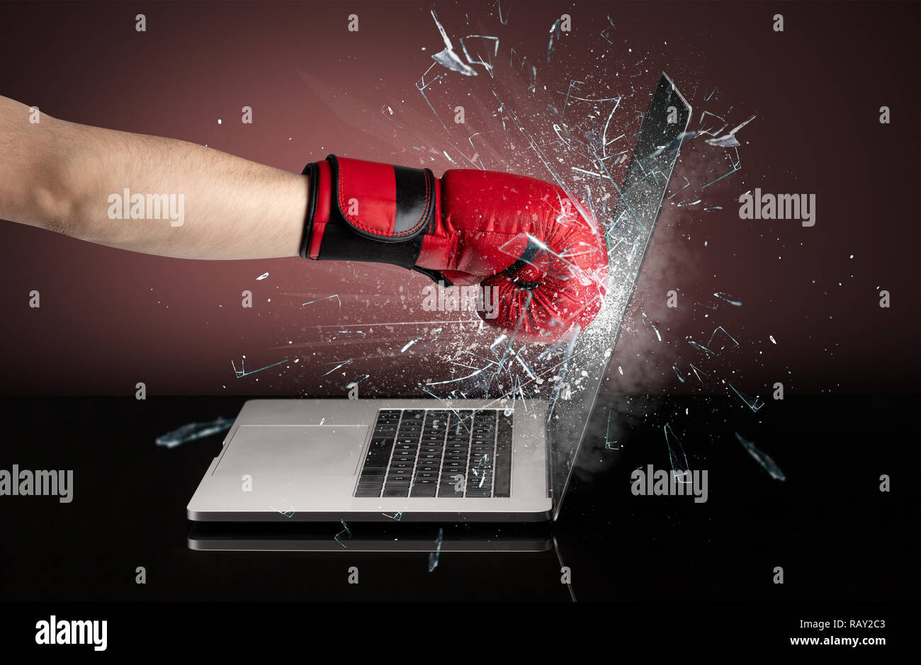 Strong arm boxing laptop screen strongly Stock Photo - Alamy
